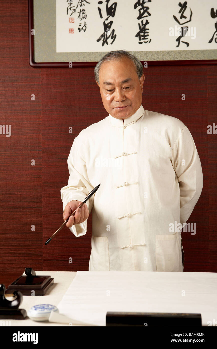 Elderly Man Practicing Calligraphy Stock Photo - Alamy