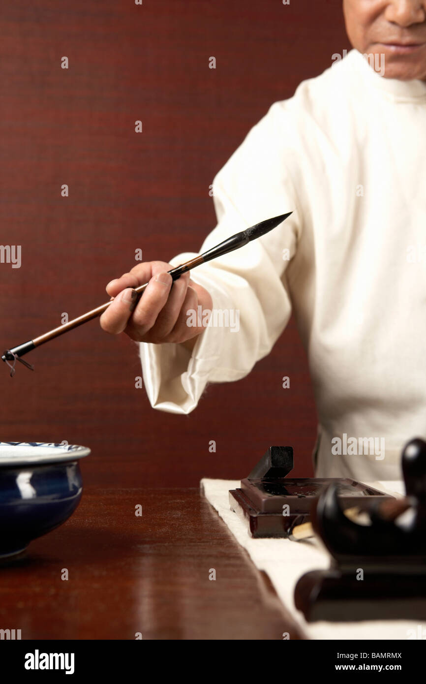 Elderly Man Practicing Calligraphy Stock Photo - Alamy