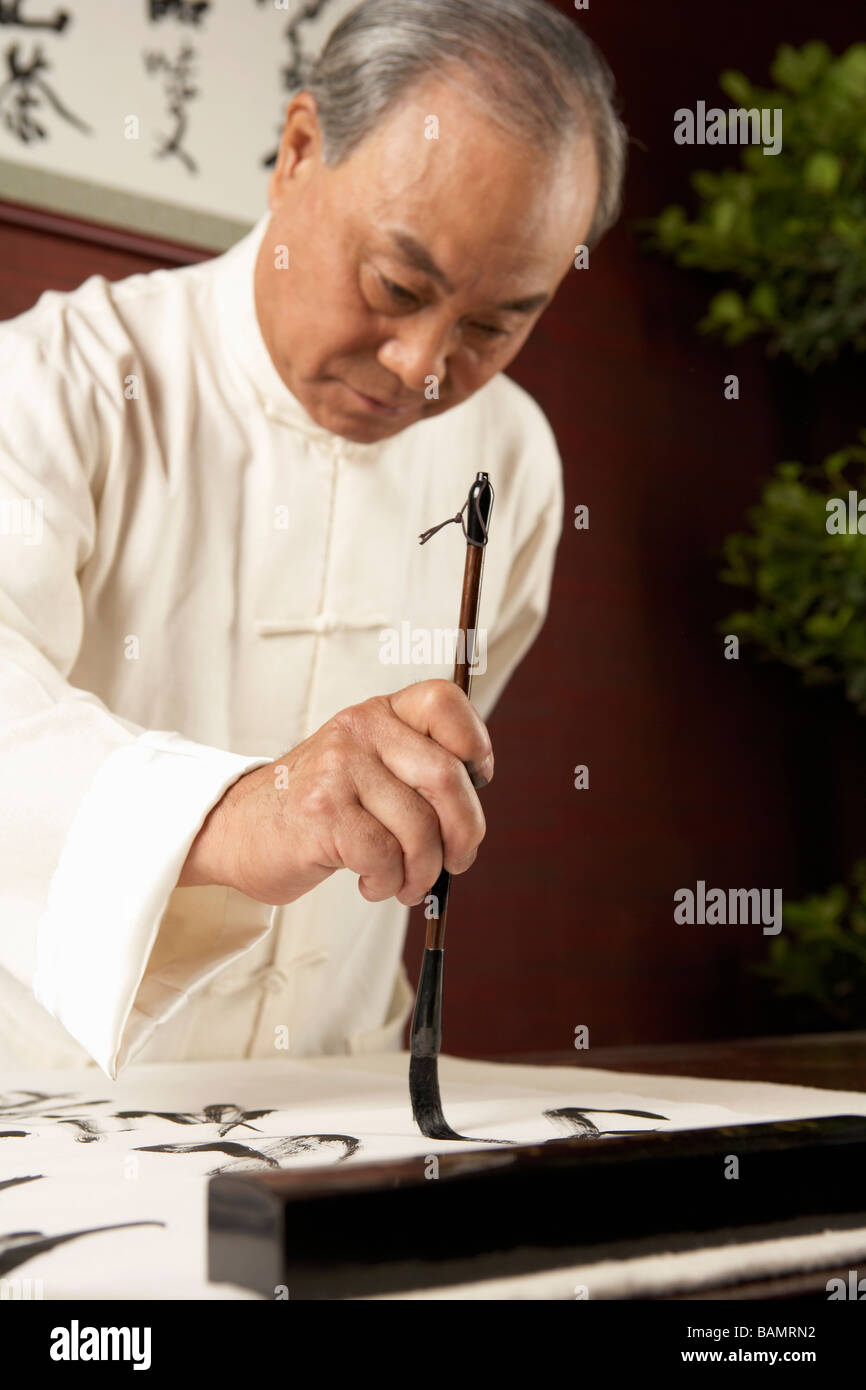 Elderly Man Practicing Calligraphy Stock Photo - Alamy