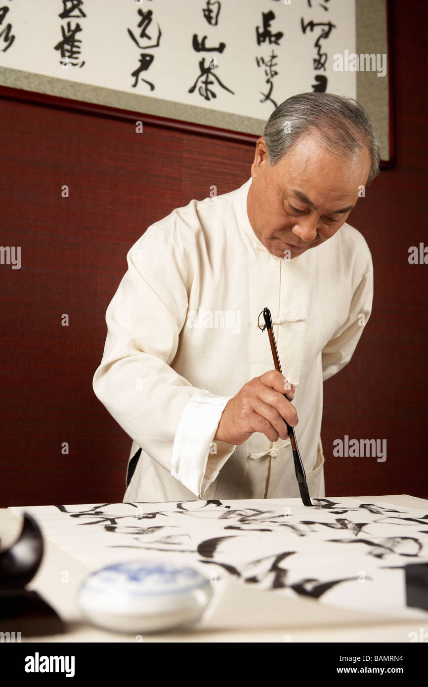 Elderly Man Practicing Calligraphy Stock Photo - Alamy