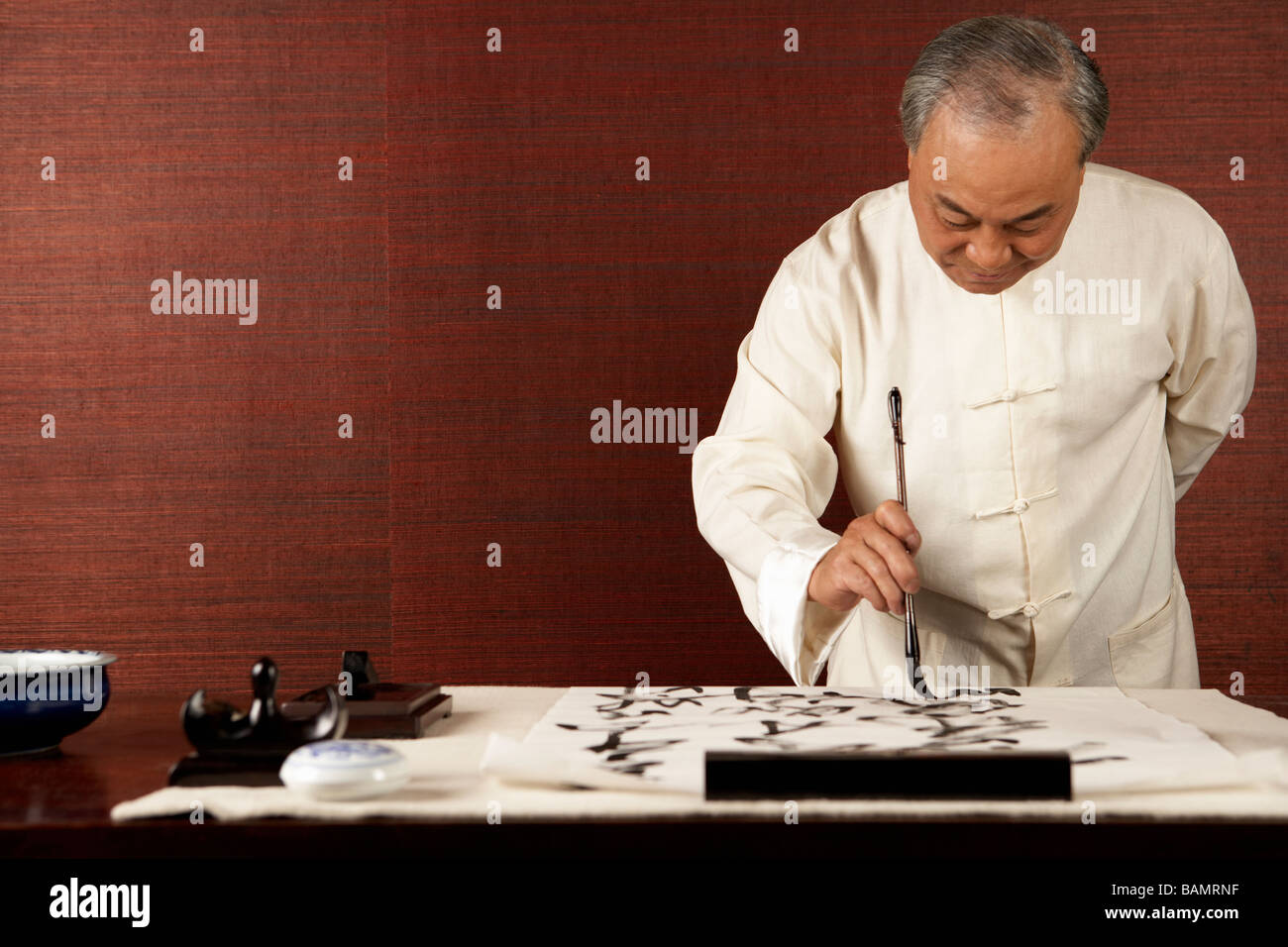 Elderly Man Practicing Calligraphy Stock Photo - Alamy