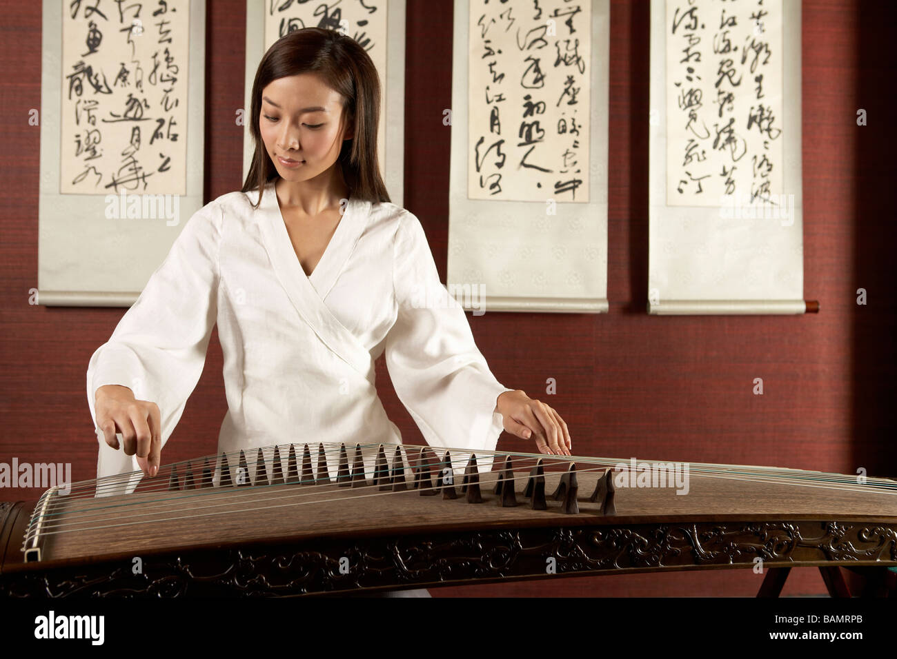 Young Woman Playing Traditional Chinese Instrument Stock Photo - Alamy