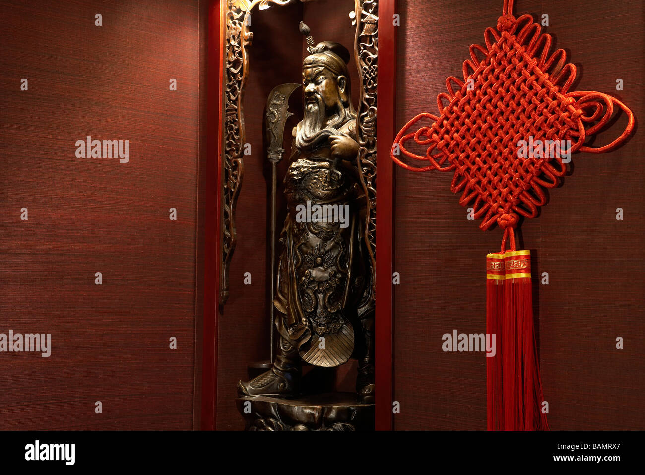Traditional Chinese Wall Shrine With Statue And Good Luck Charm Stock ...