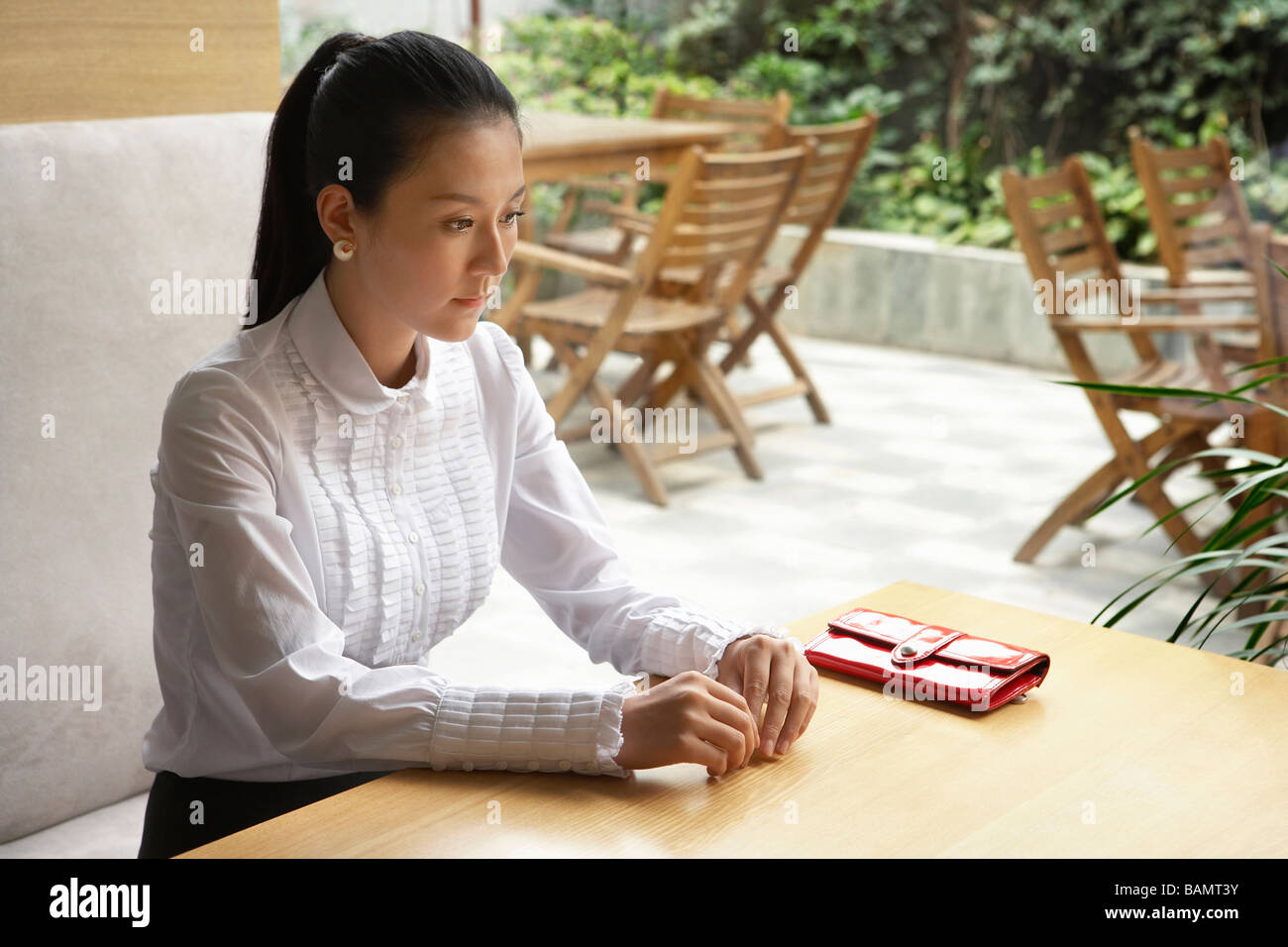 Asian woman waiting tables hi-res stock photography and images - Alamy