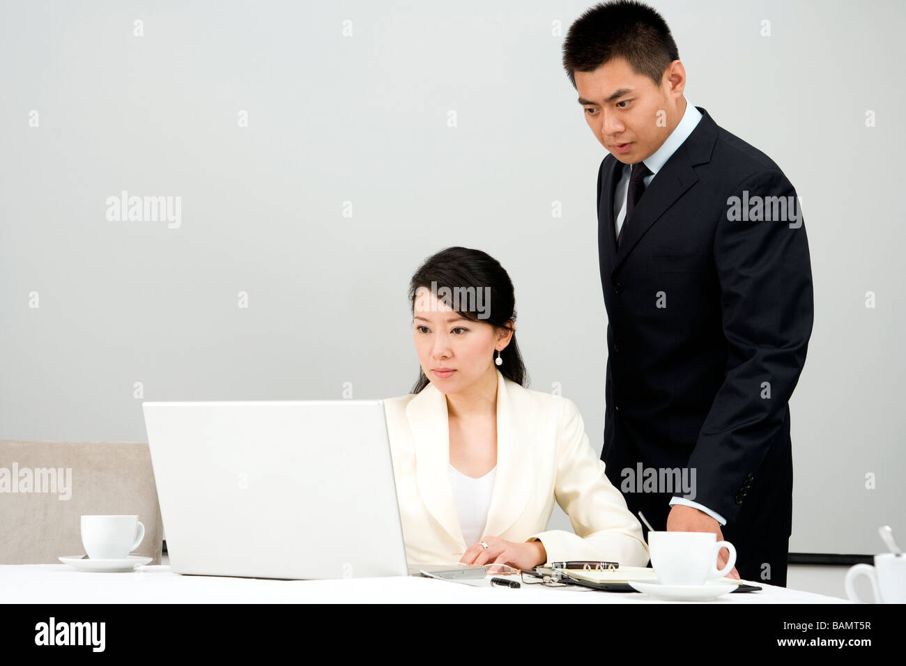 Businesspeople During Working Lunch Stock Photo - Alamy