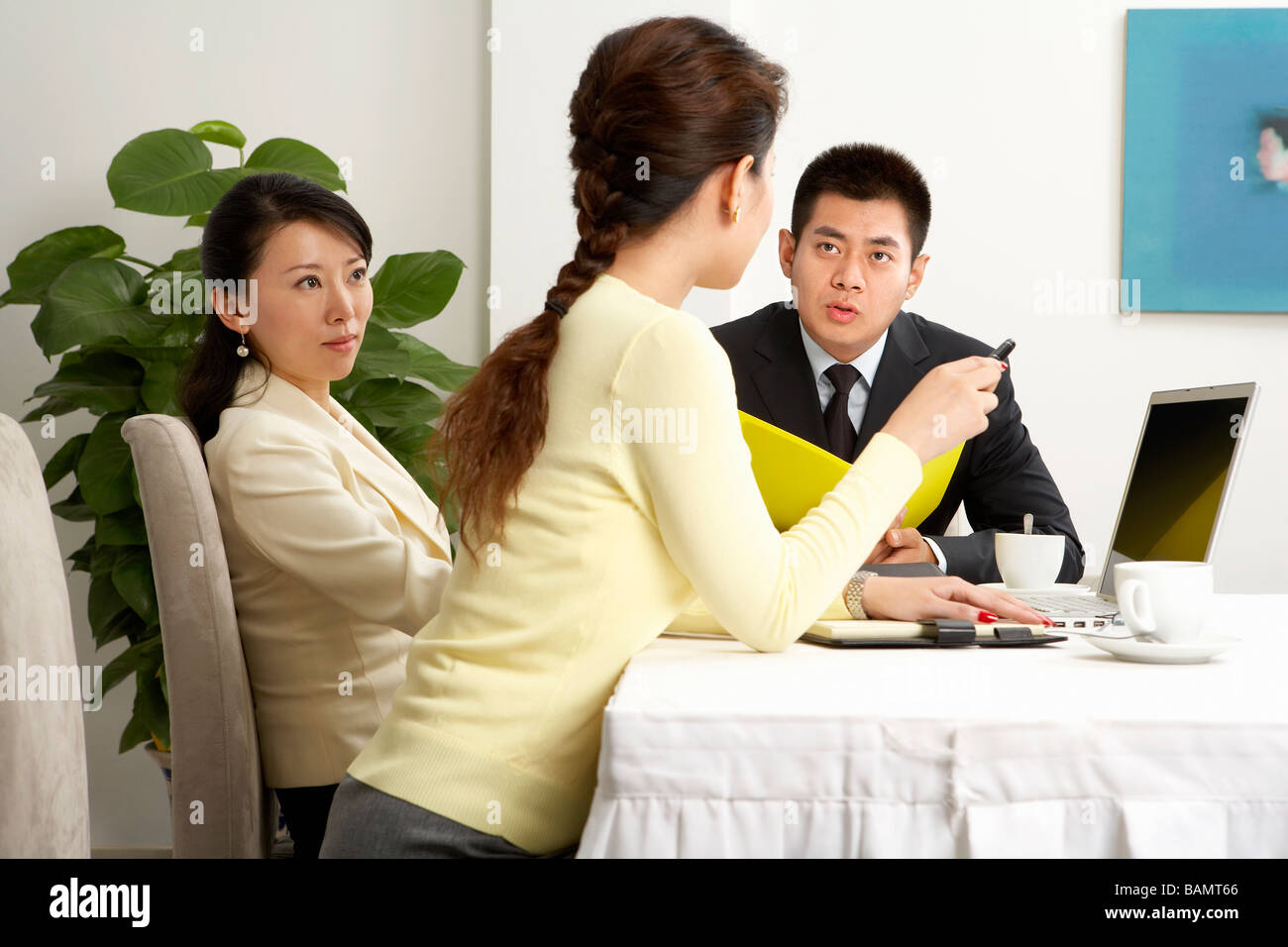 Businesspeople During Working Lunch Stock Photo - Alamy