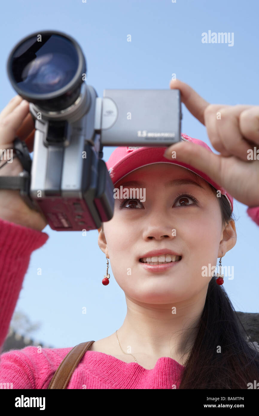 Woman Filming The Sights Of The Great Wall Of China Stock Photo - Alamy