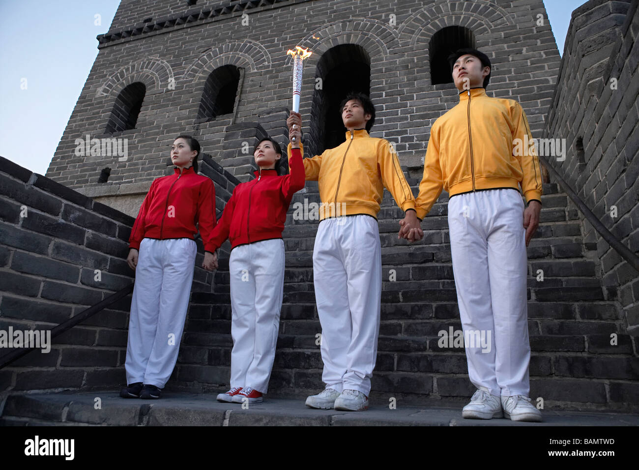 Two Young Couples Perform The Passing Of The Torch Ceremony At The ...