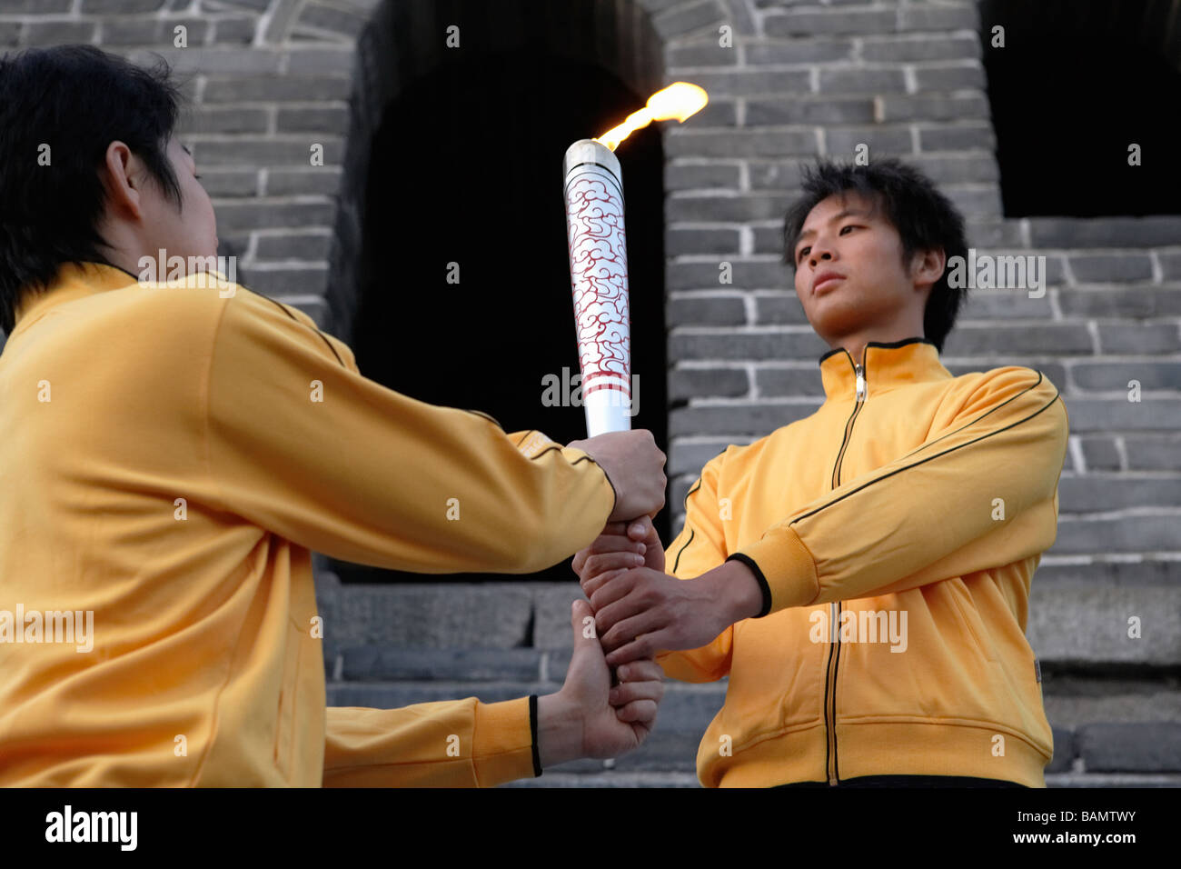 Man passing torch hi-res stock photography and images - Alamy