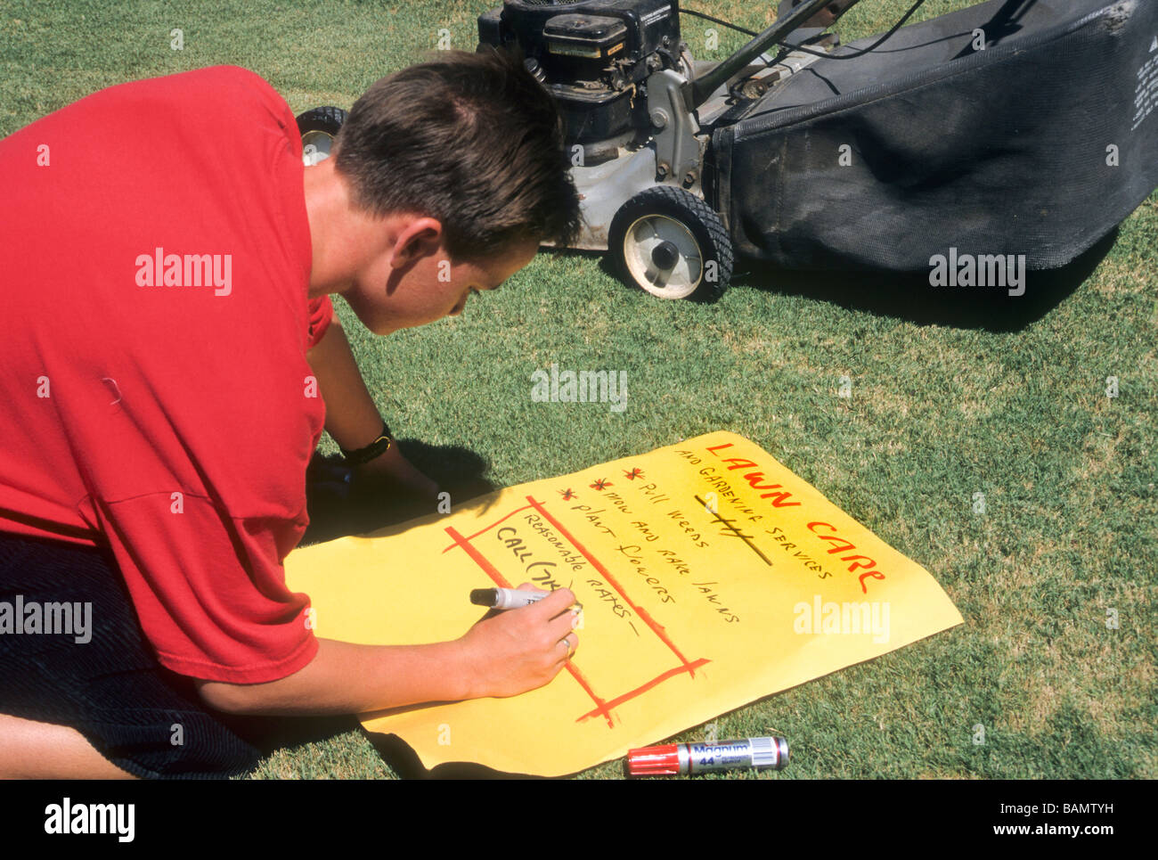 Teen boy make create print sign ad advertise look work job chore cut ...