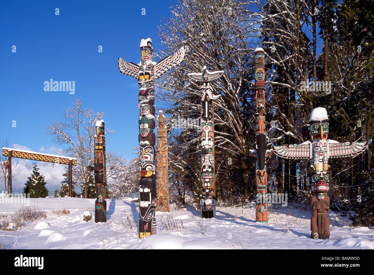 Snow Covered Totem Poles in Winter at Brockton Point in Stanley Park ...