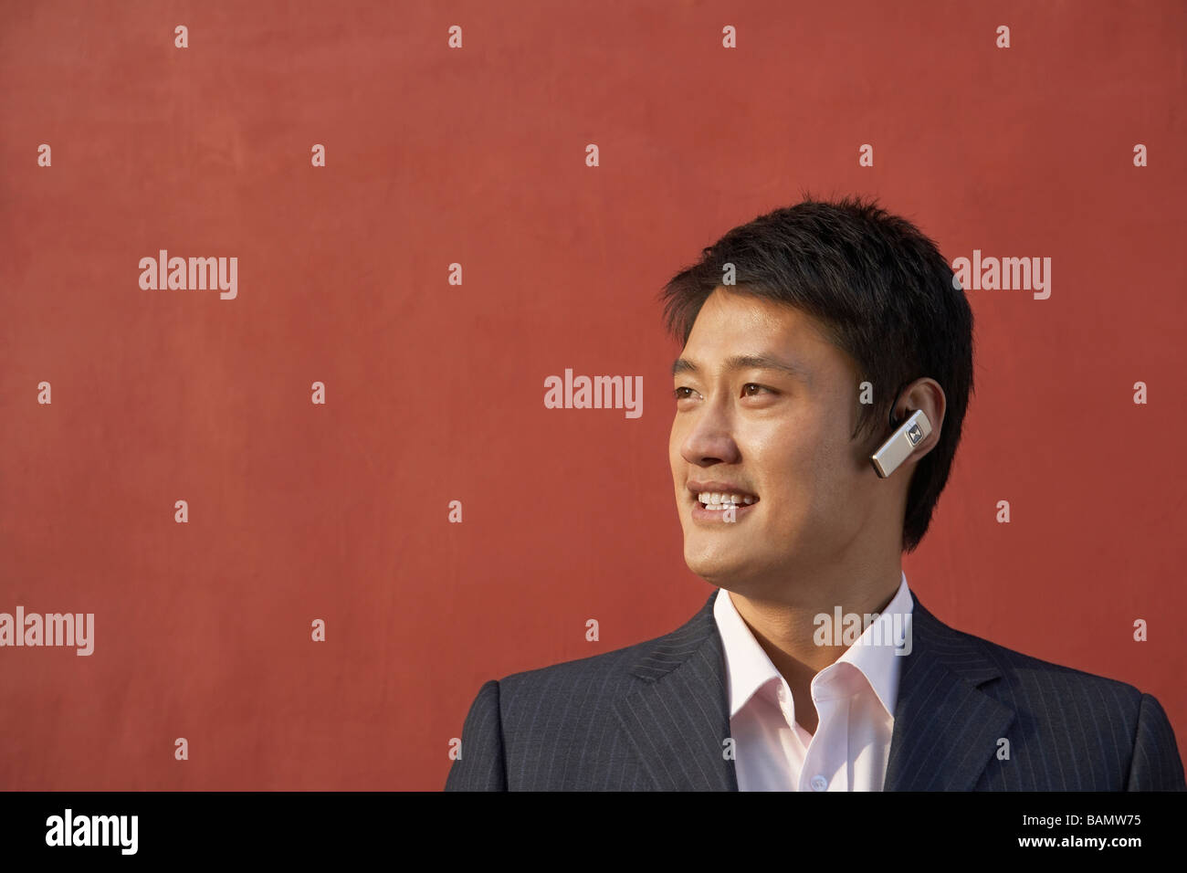 Blue tooth ear device hi-res stock photography and images - Alamy