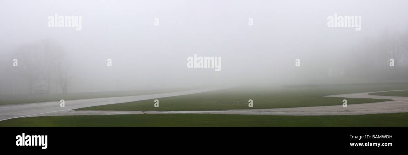Panorama foggy mist hanging over roadway Stock Photo - Alamy