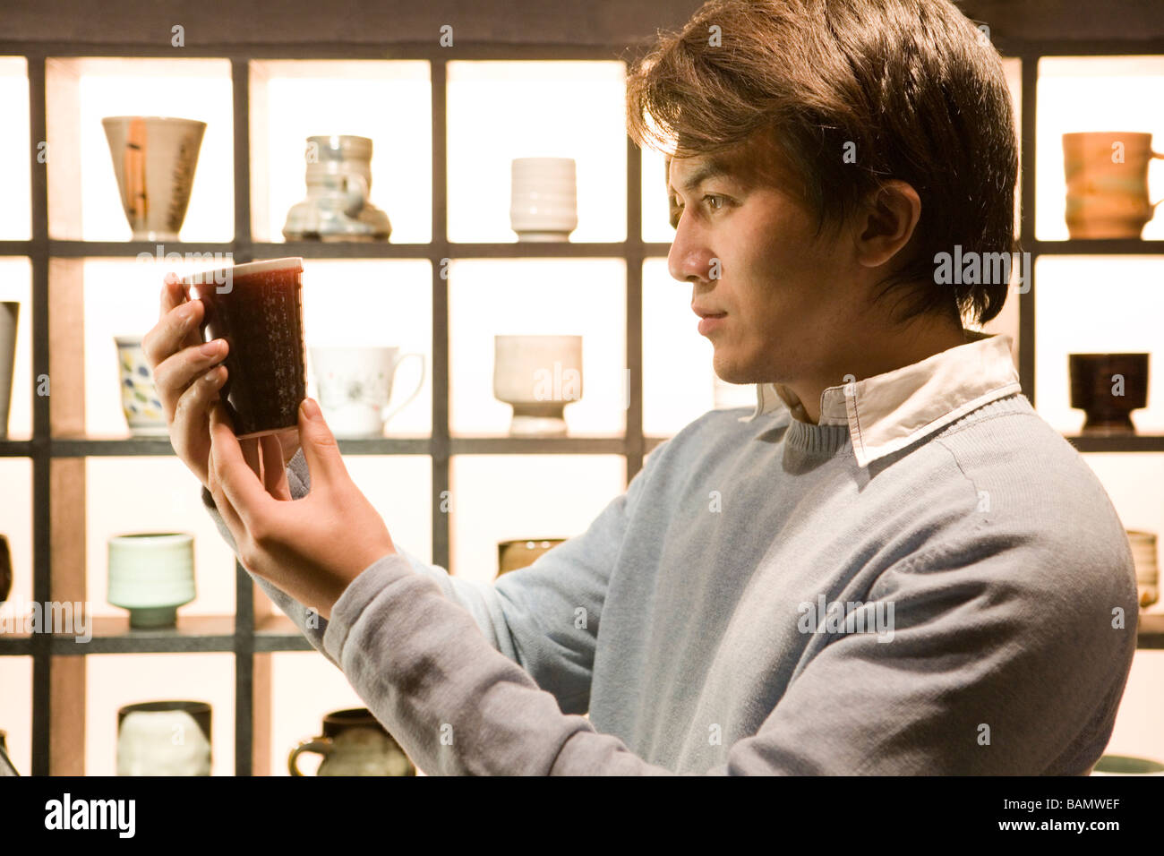 Man buys cup hi-res stock photography and images - Alamy