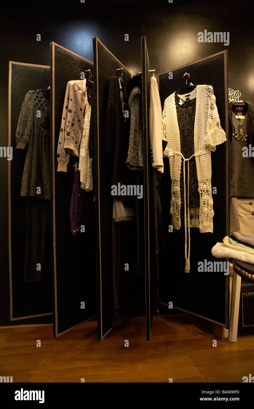 Clothes Hanging On A Rack Stock Photo - Alamy