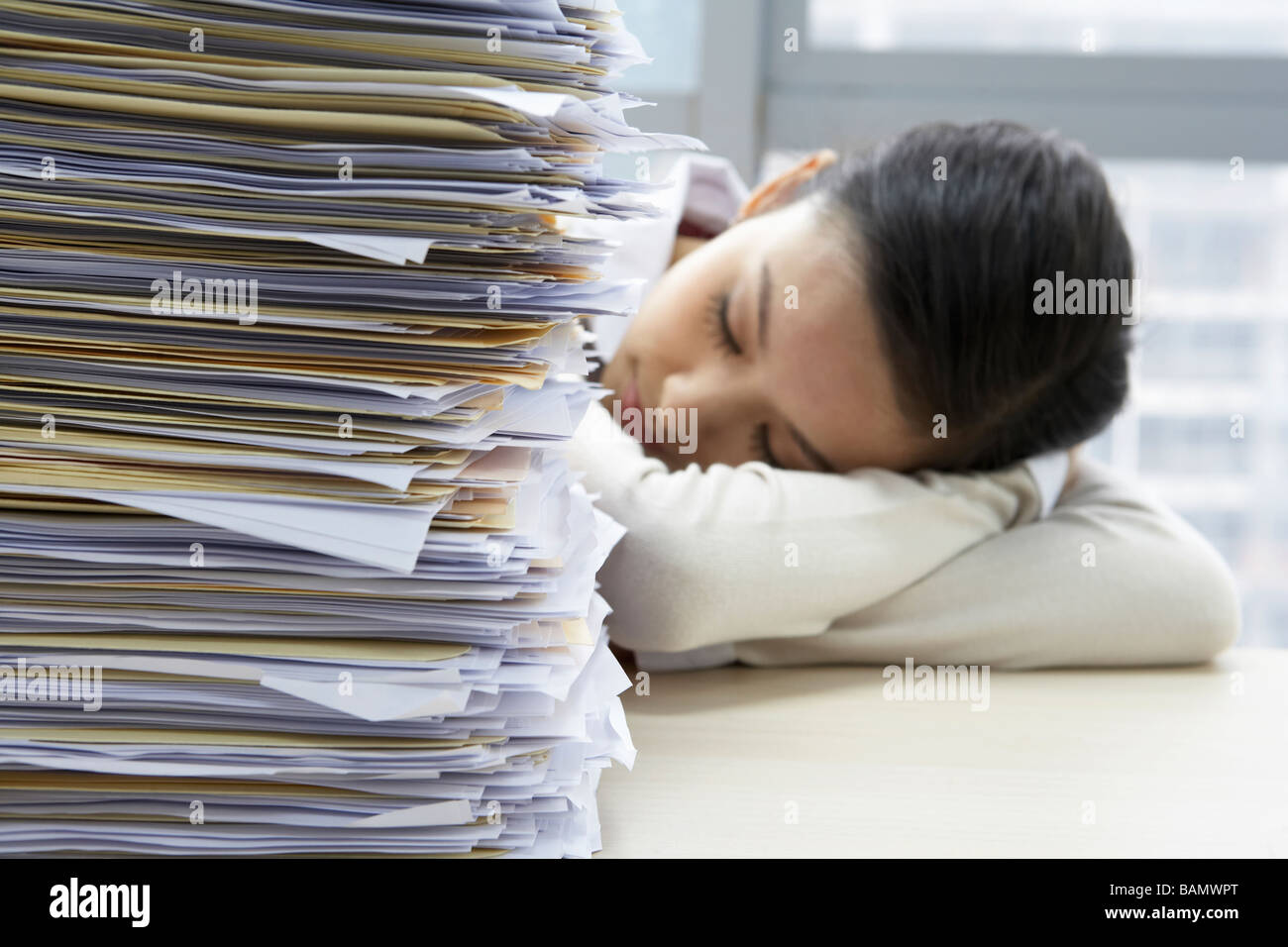 Woman office desk piles of paperwork hi-res stock photography and ...