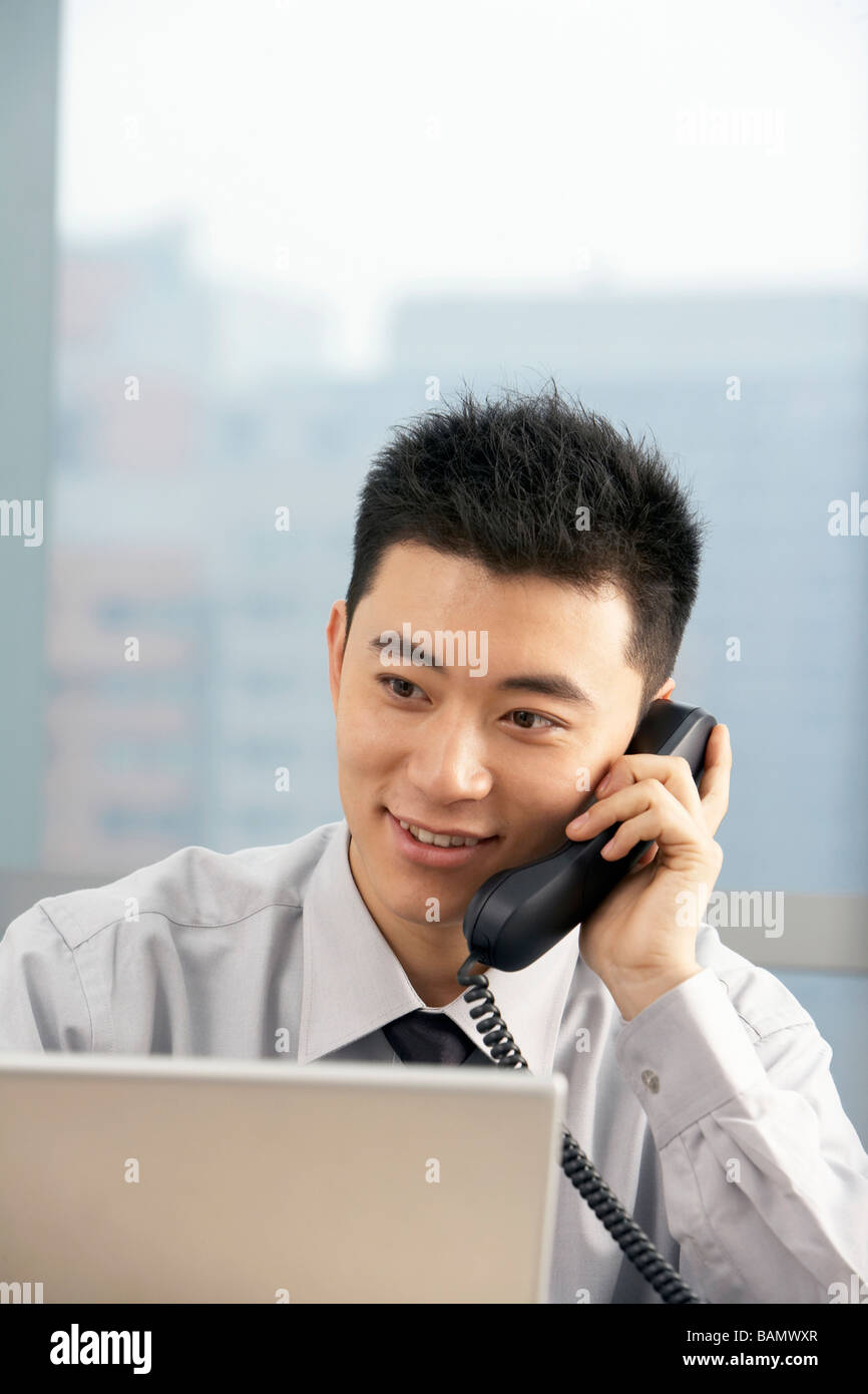 Positive delighted businessman communicating hi-res stock photography ...