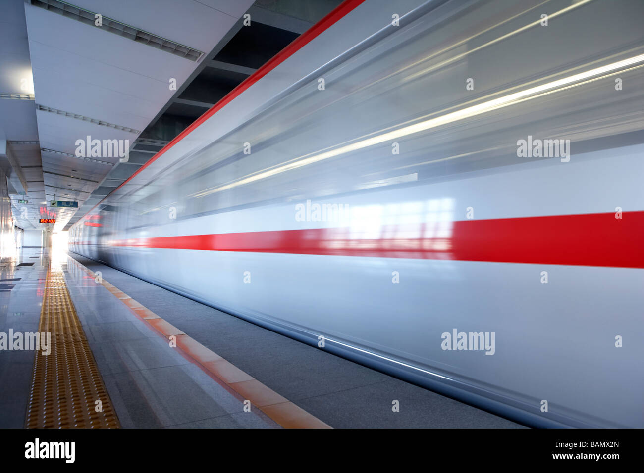 Subway Train Speeding Past Platform Stock Photo - Alamy