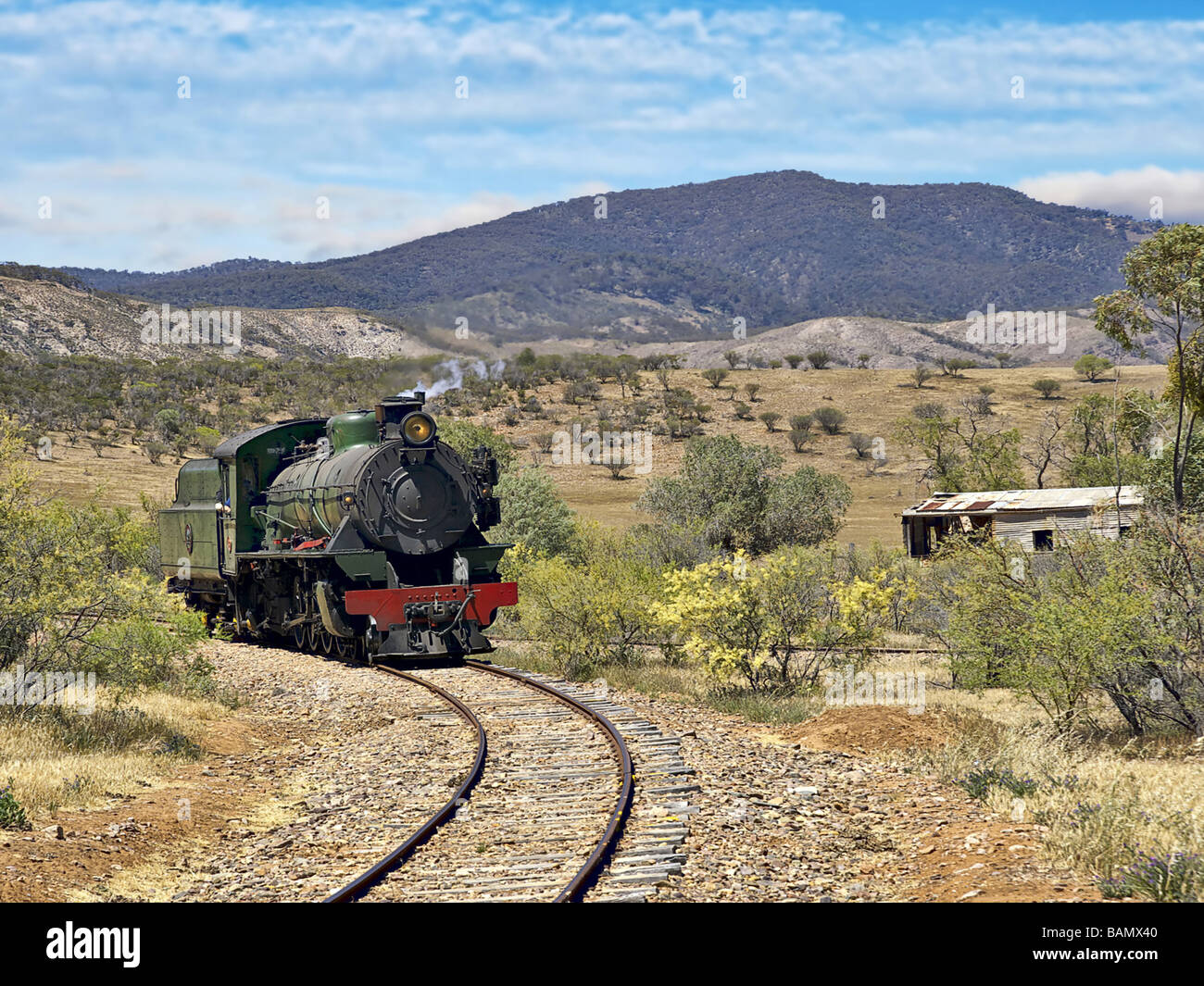steam train coming around the corner Stock Photo - Alamy