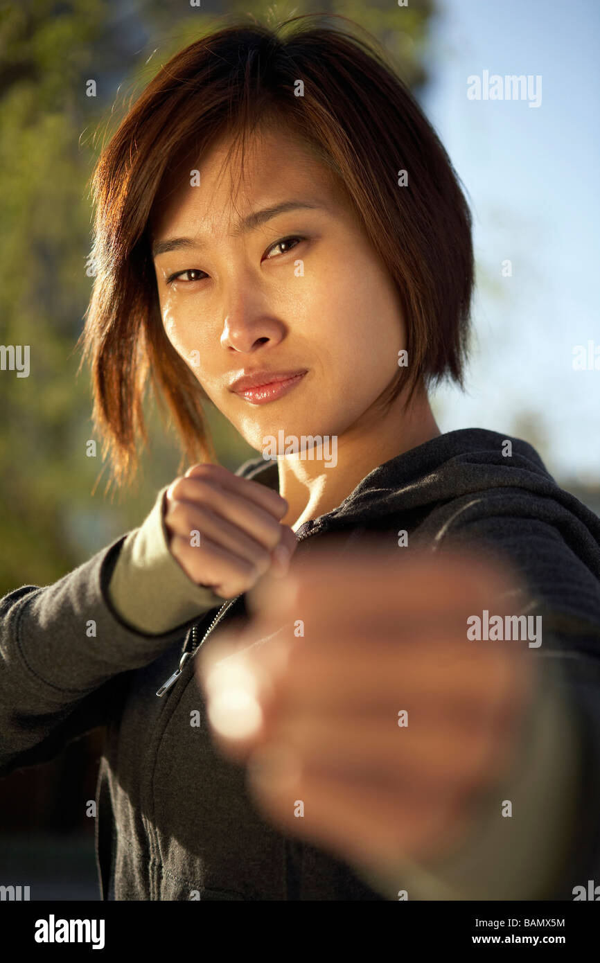 Young Woman Practicing Martial Arts Stock Photo - Alamy