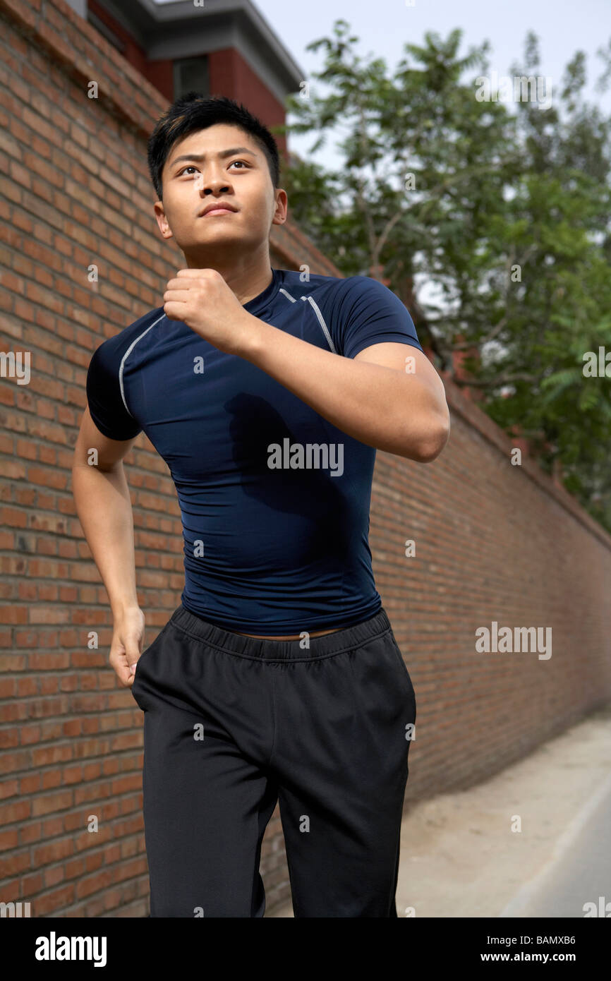 Male jogging one person trousers hi-res stock photography and images ...