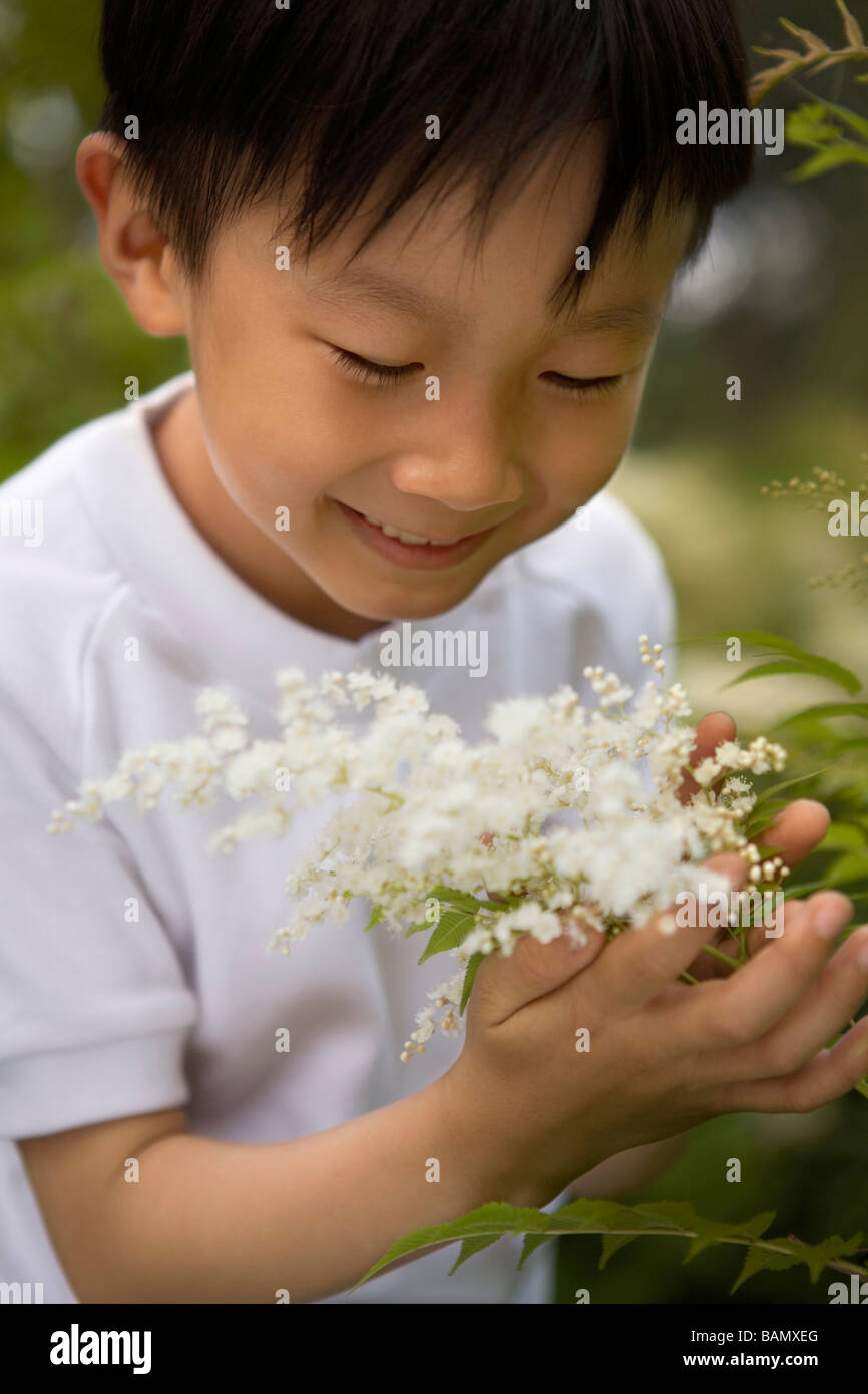 Child kid happy enjoying sniffing hi-res stock photography and images ...