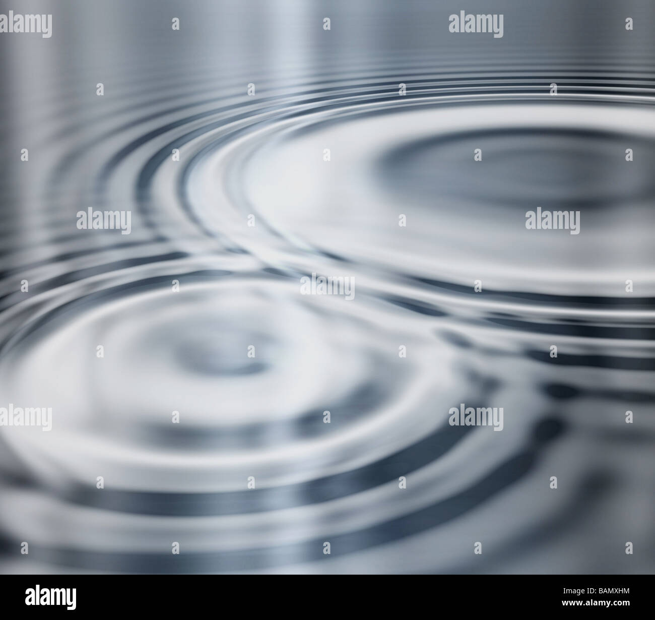 ripples in shiny alloy or steel metal background Stock Photo - Alamy