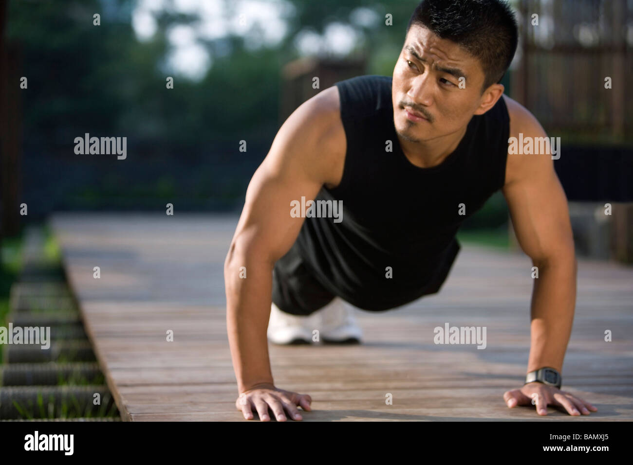 Man Doing Push-Ups Stock Photo - Alamy