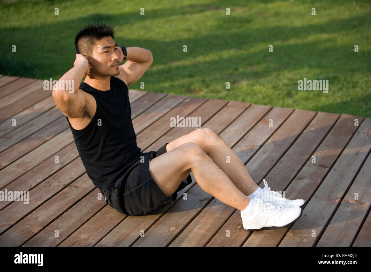 Athletic man exercising on hi-res stock photography and images - Alamy
