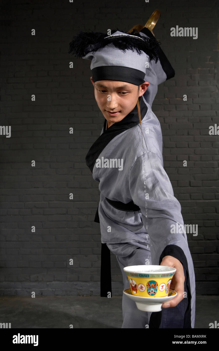 Tradtional Chinese waiter Stock Photo - Alamy