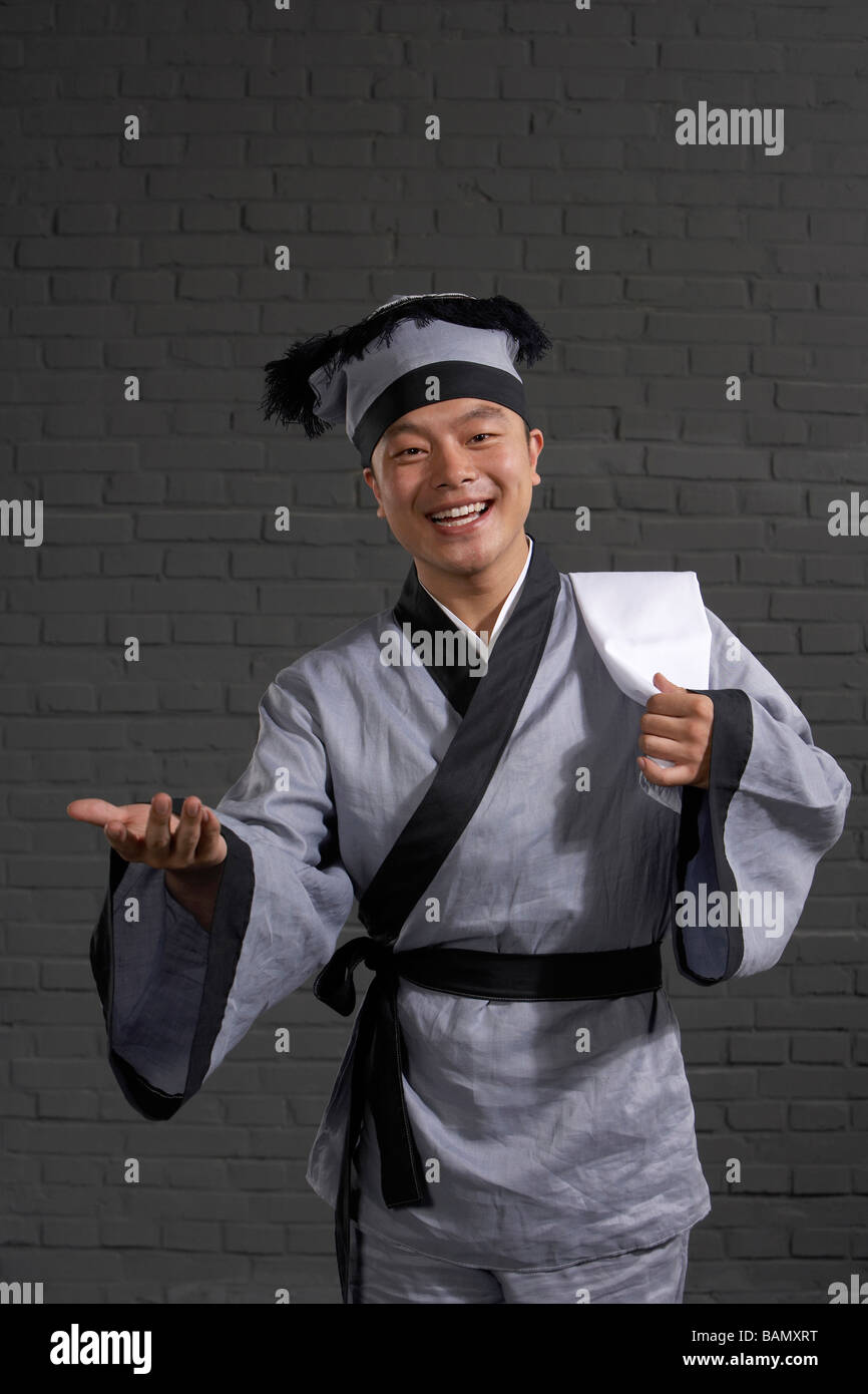 Tradtional Chinese waiter Stock Photo - Alamy