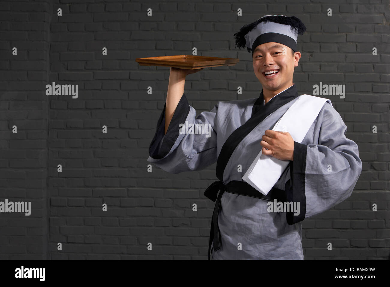 Tradtional Chinese waiter Stock Photo - Alamy