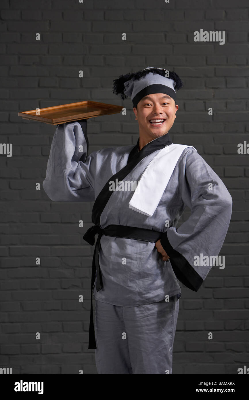Tradtional Chinese waiter Stock Photo - Alamy