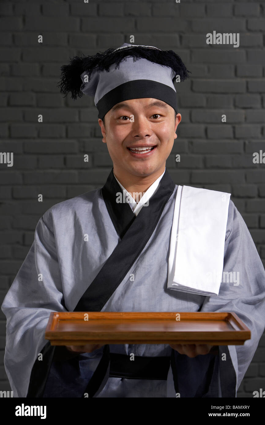 Tradtional Chinese waiter Stock Photo - Alamy