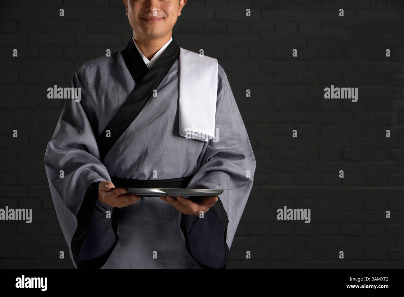 Tradtional Chinese waiter Stock Photo - Alamy