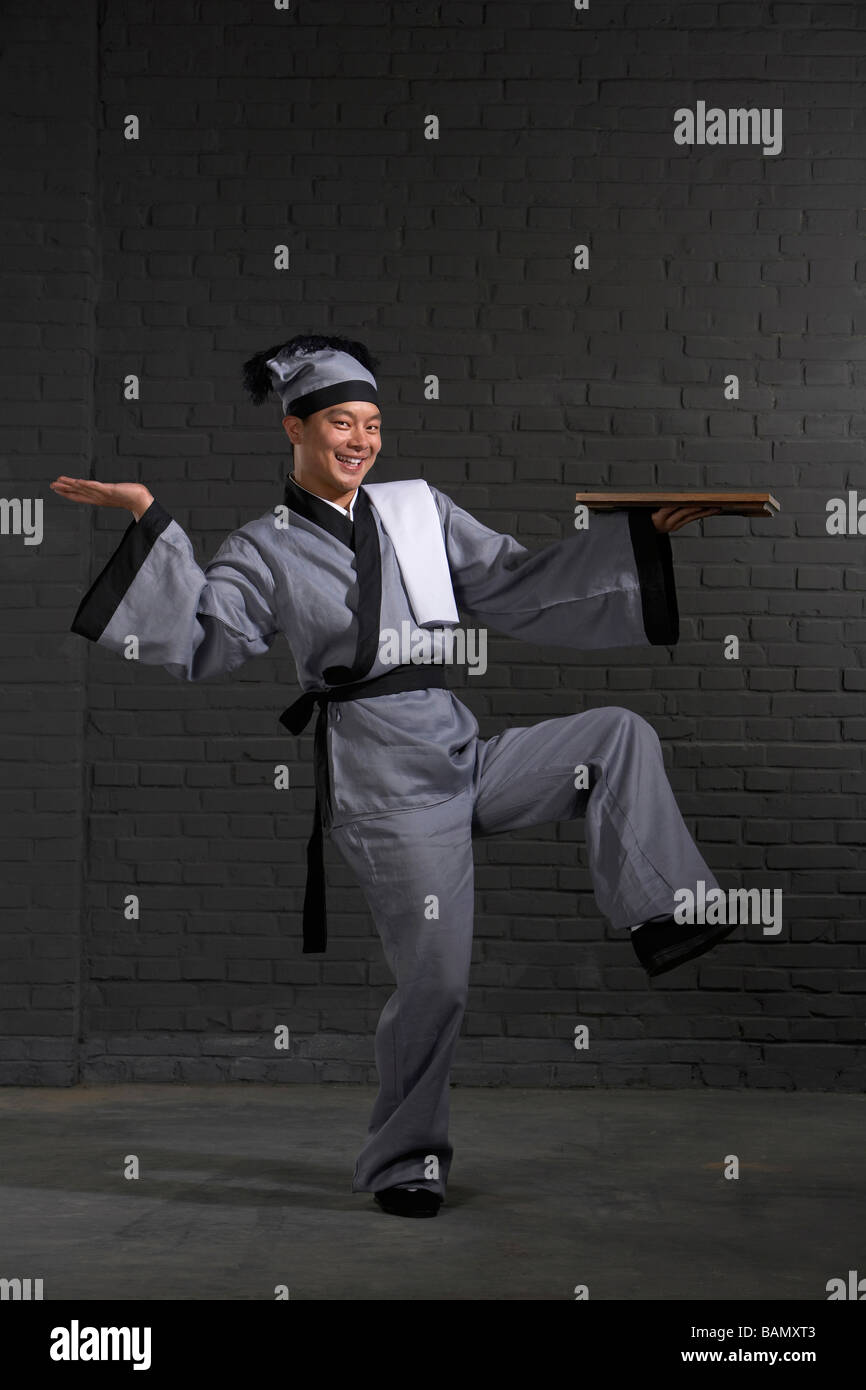 Tradtional Chinese waiter Stock Photo - Alamy