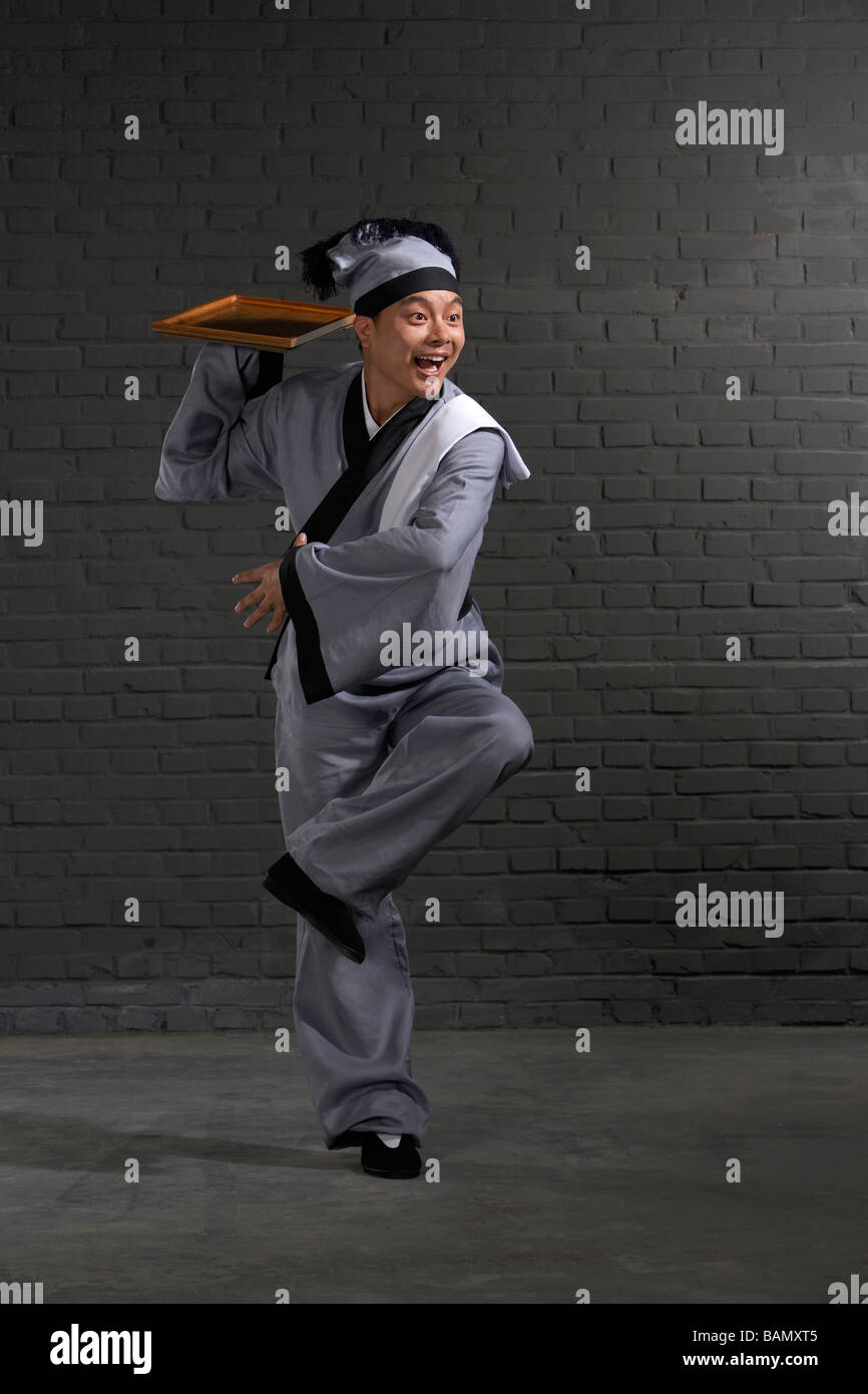 Tradtional Chinese waiter Stock Photo - Alamy