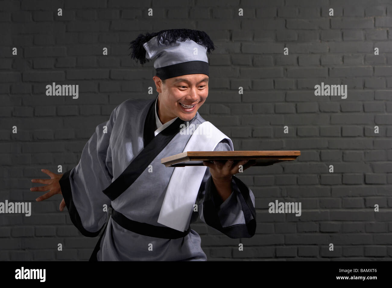 Tradtional Chinese waiter Stock Photo - Alamy