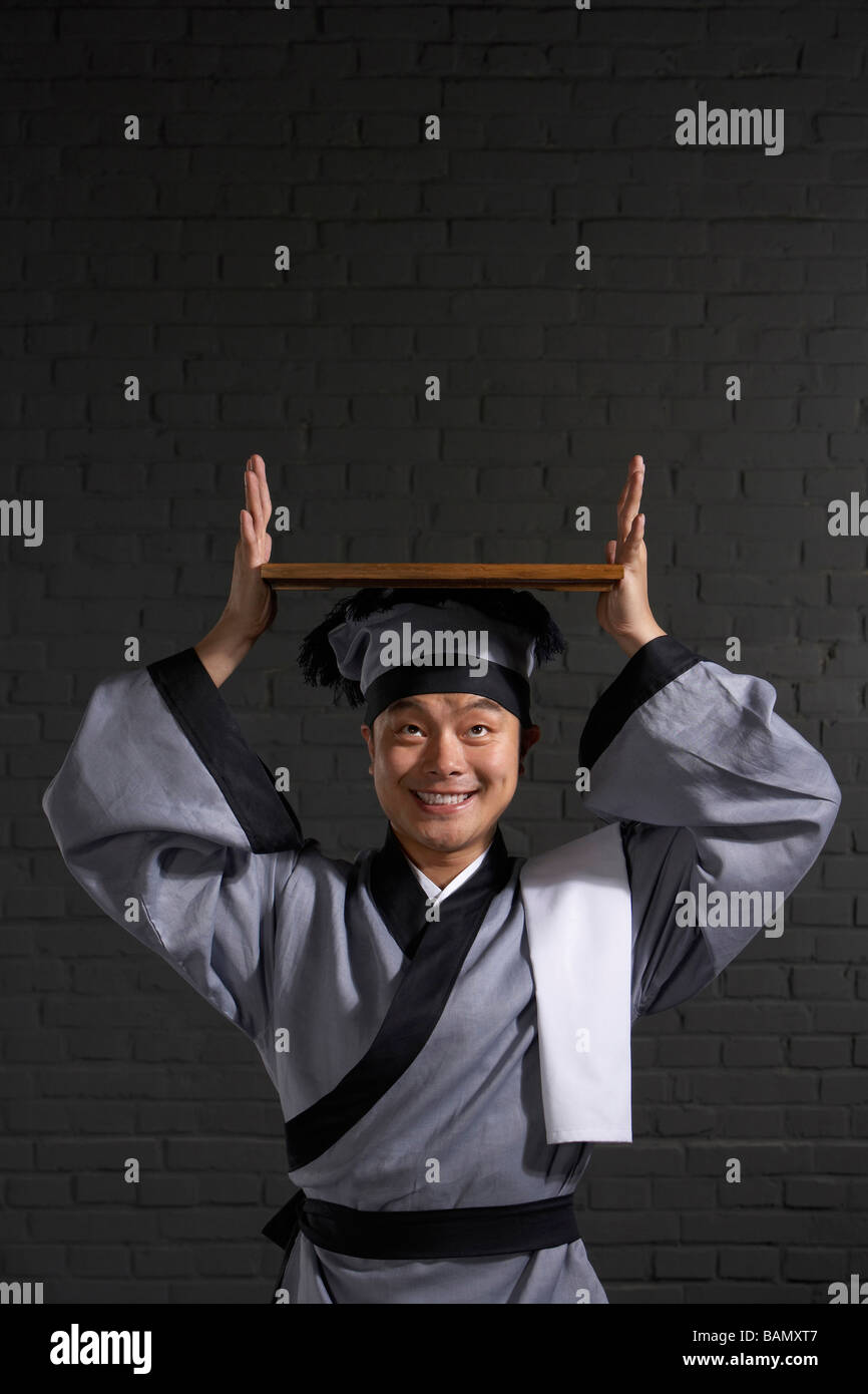 Tradtional Chinese waiter Stock Photo - Alamy