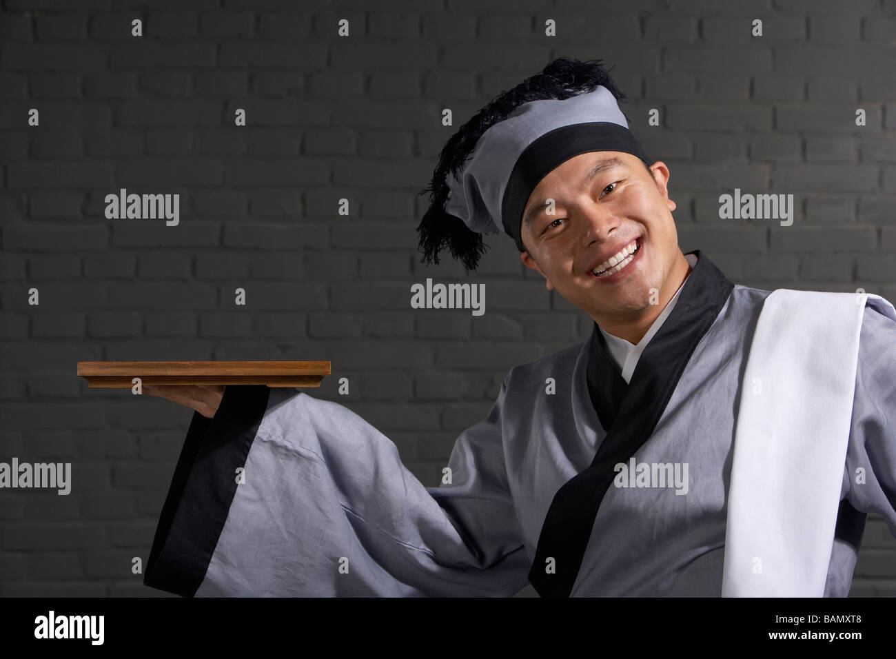 Tradtional Chinese waiter Stock Photo - Alamy