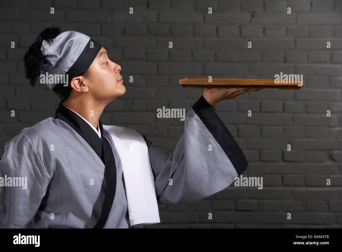Tradtional Chinese waiter Stock Photo - Alamy