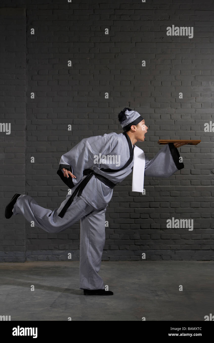 Tradtional Chinese waiter Stock Photo - Alamy