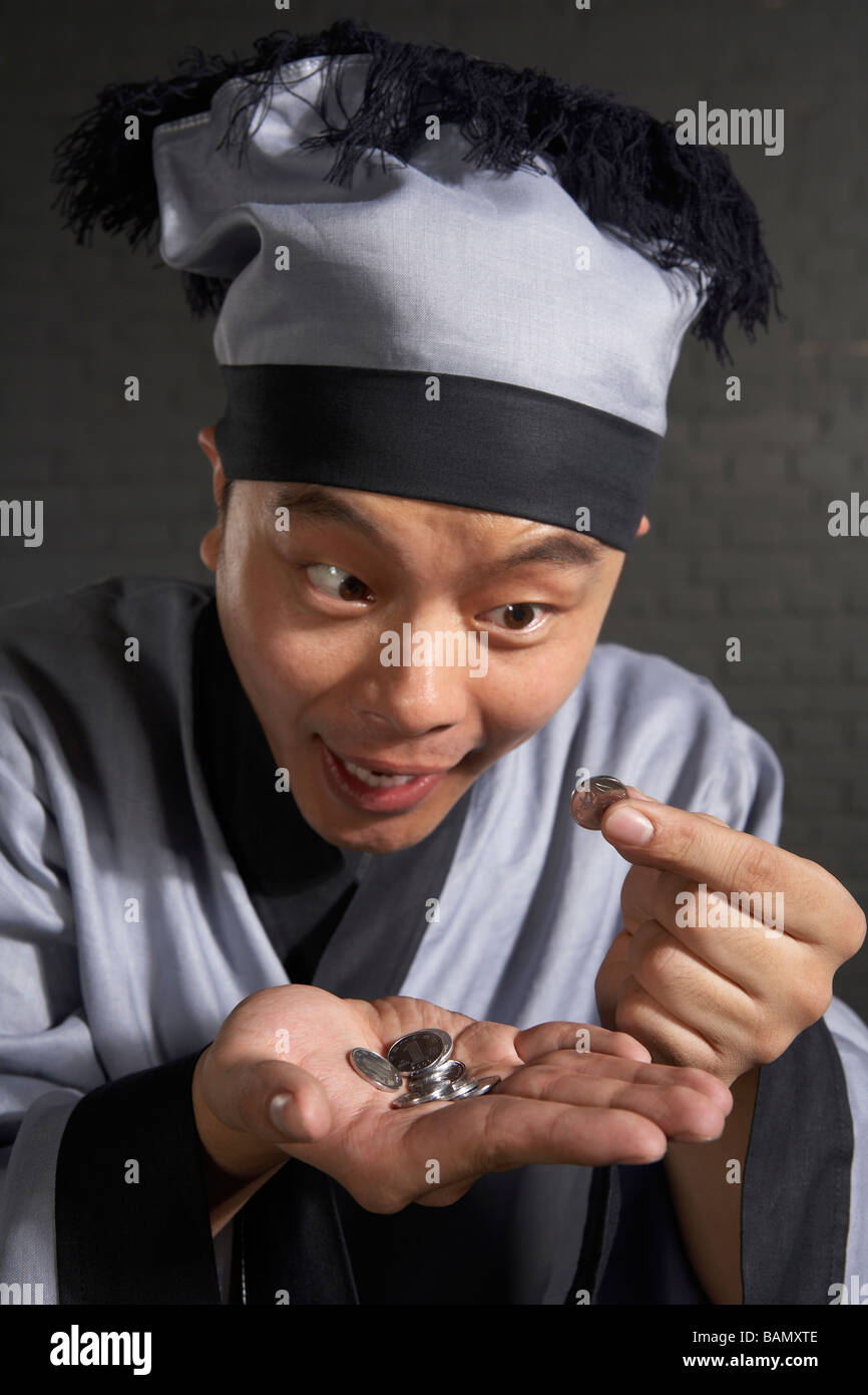 Tradtional Chinese waiter Stock Photo - Alamy