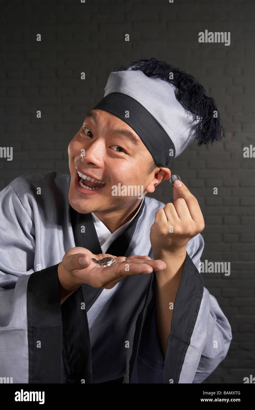 Tradtional Chinese waiter Stock Photo - Alamy