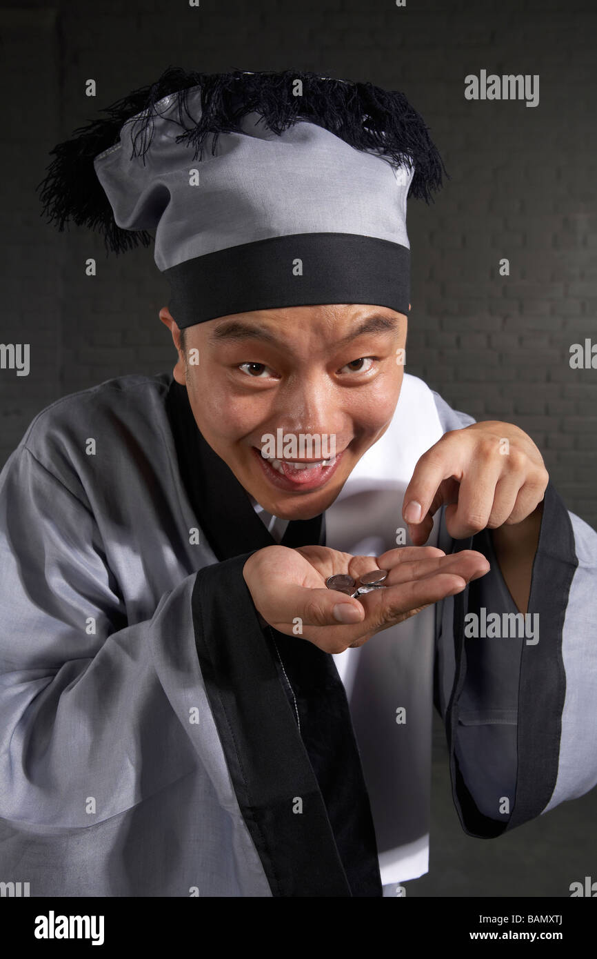 Tradtional Chinese waiter Stock Photo - Alamy
