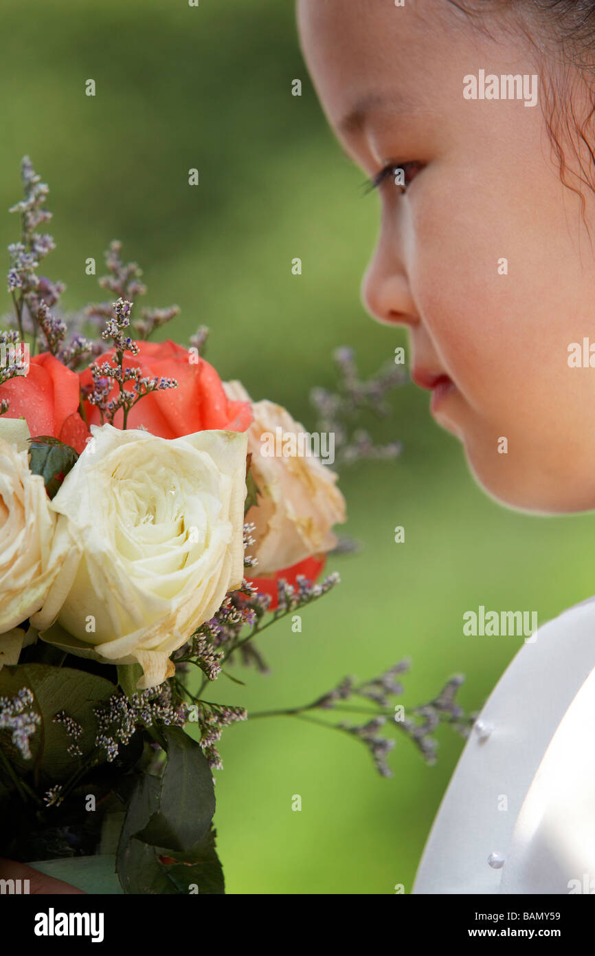 A young flower girl for a wedding Stock Photo - Alamy