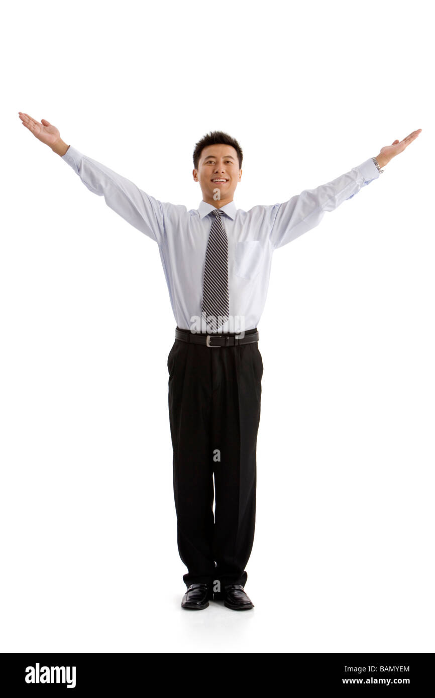 A businessman with his hands held out wide Stock Photo - Alamy