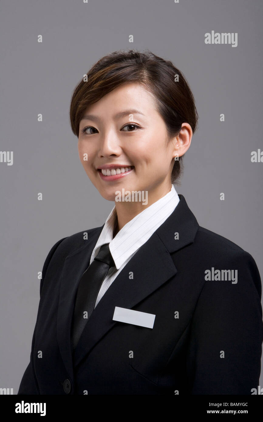 Portrait of a woman in the services industry Stock Photo - Alamy