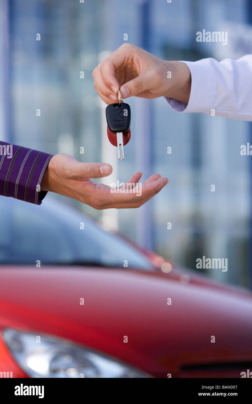 Handing key cars hi-res stock photography and images - Alamy