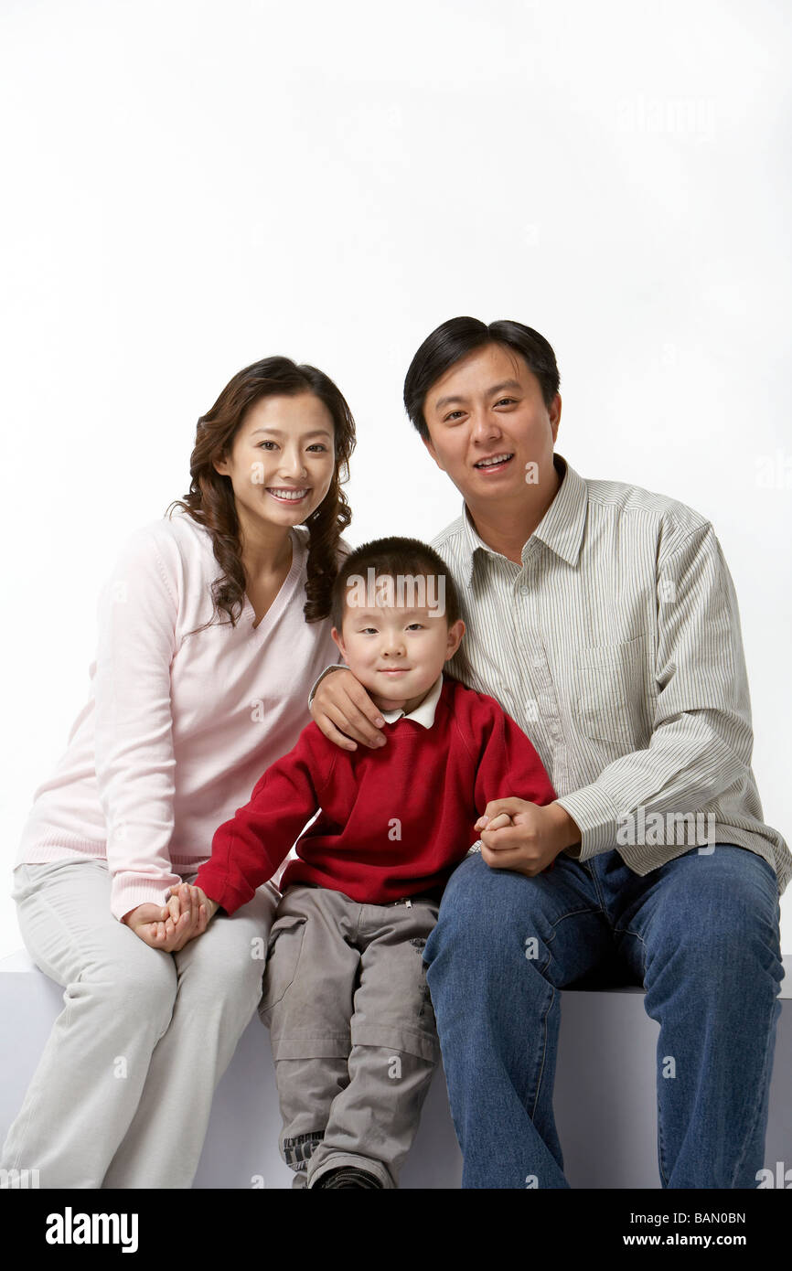 Portrait of a young single child family Stock Photo - Alamy